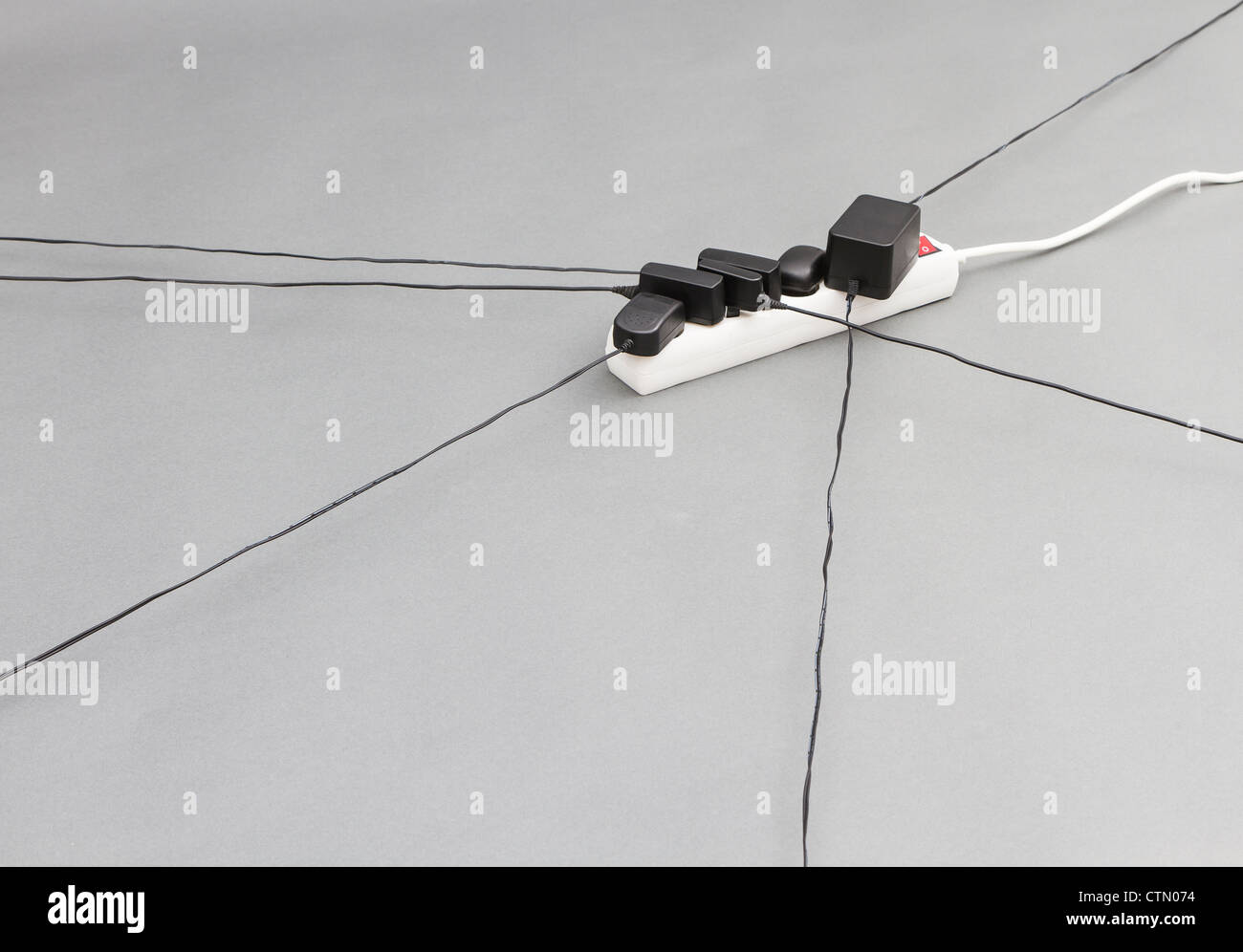 multiple socket with many power supplies in grey background Stock Photo ...