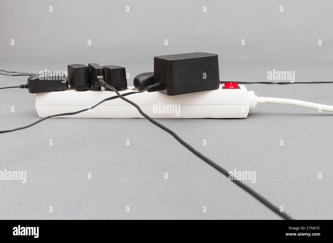 multiple socket with many power supplies in grey background Stock Photo ...