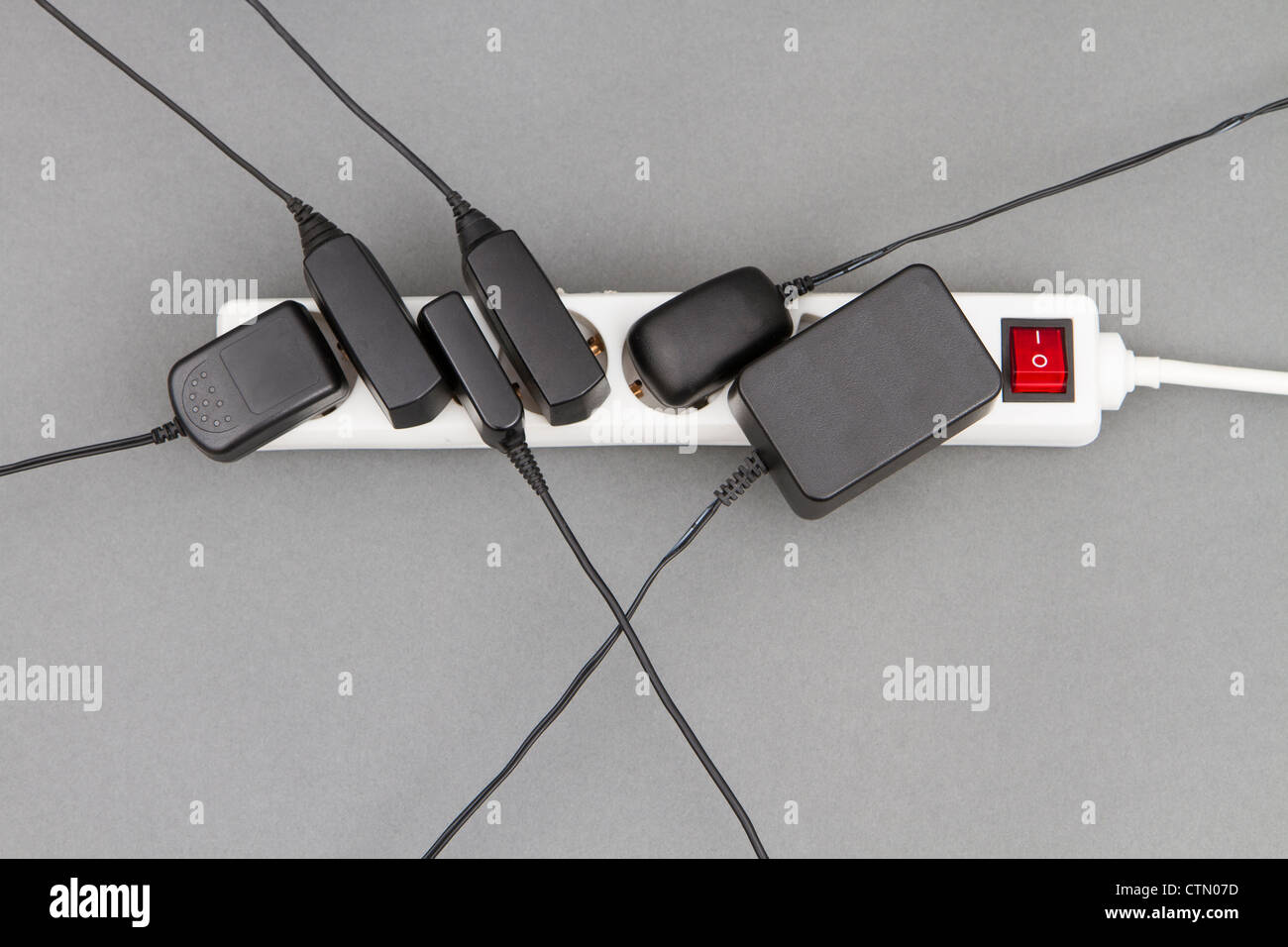 multiple socket with many power supplies in grey background Stock Photo ...