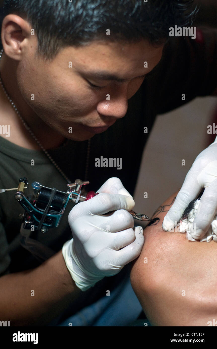 Sak Yoan. Sacred 'protection' tattoos in Cambodia. The tattoo tradition ...
