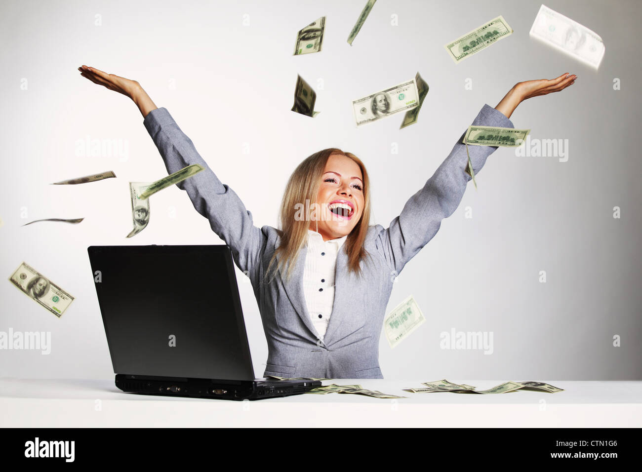 business woman drop dollars in the air Stock Photo - Alamy