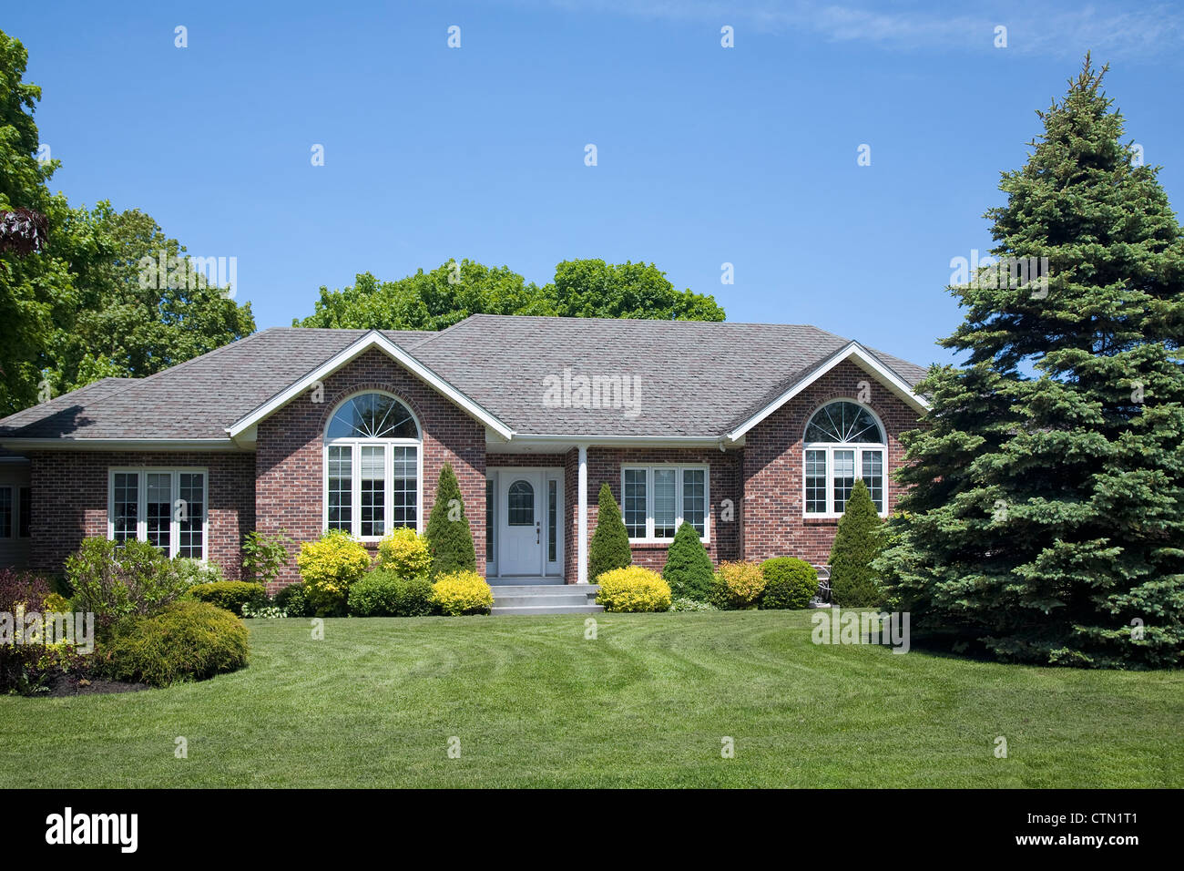 A contemporary family brick home built in the suburbs Stock Photo - Alamy