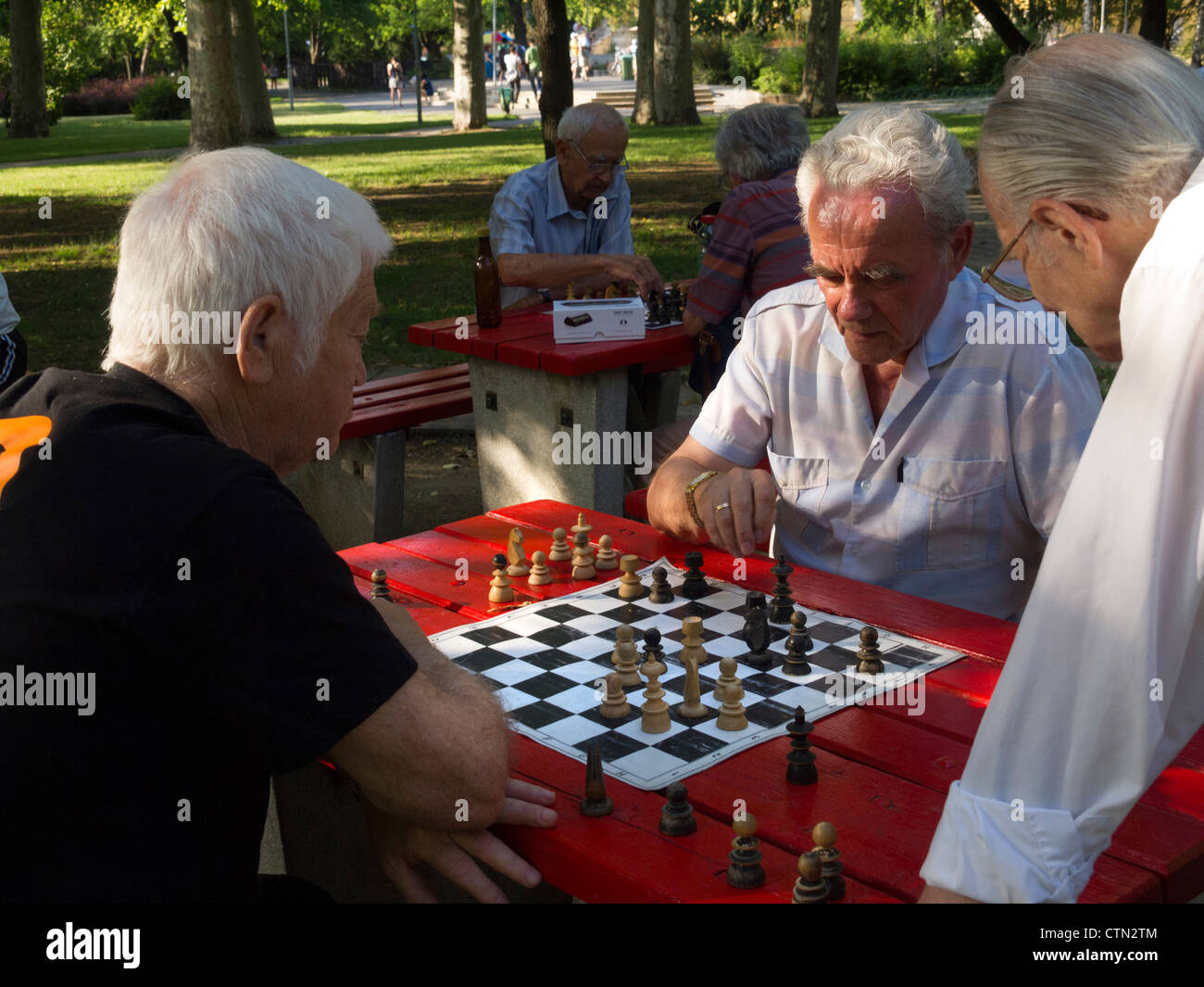 Elderly men playing chess in the city park of Budapest, Hungary ...