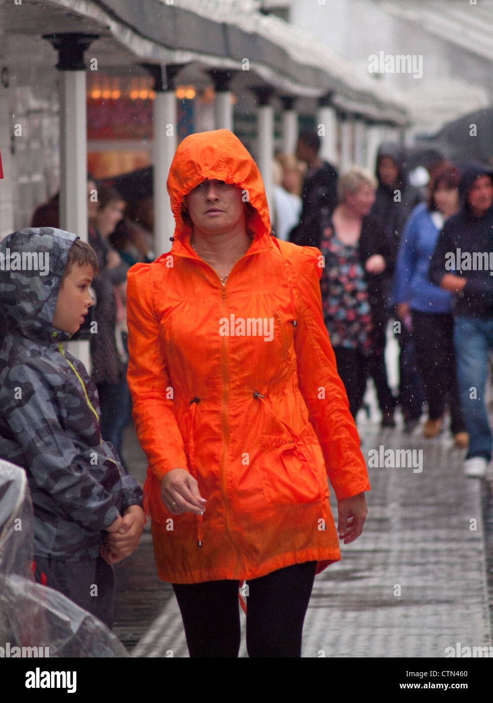 A wet summers day on the pier at Brighton Stock Photo - Alamy
