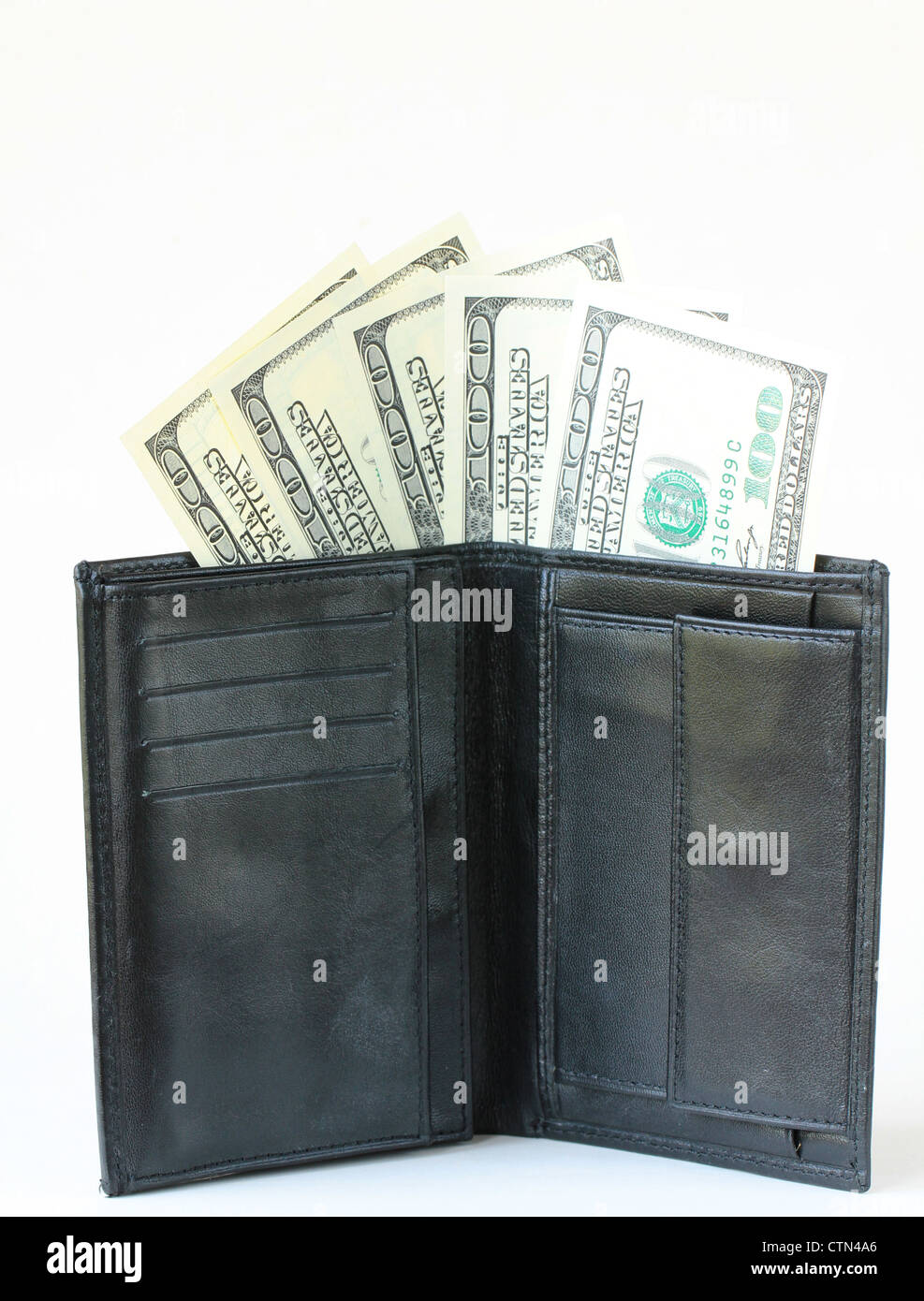 U.S. currency dollars in the black purse Stock Photo - Alamy