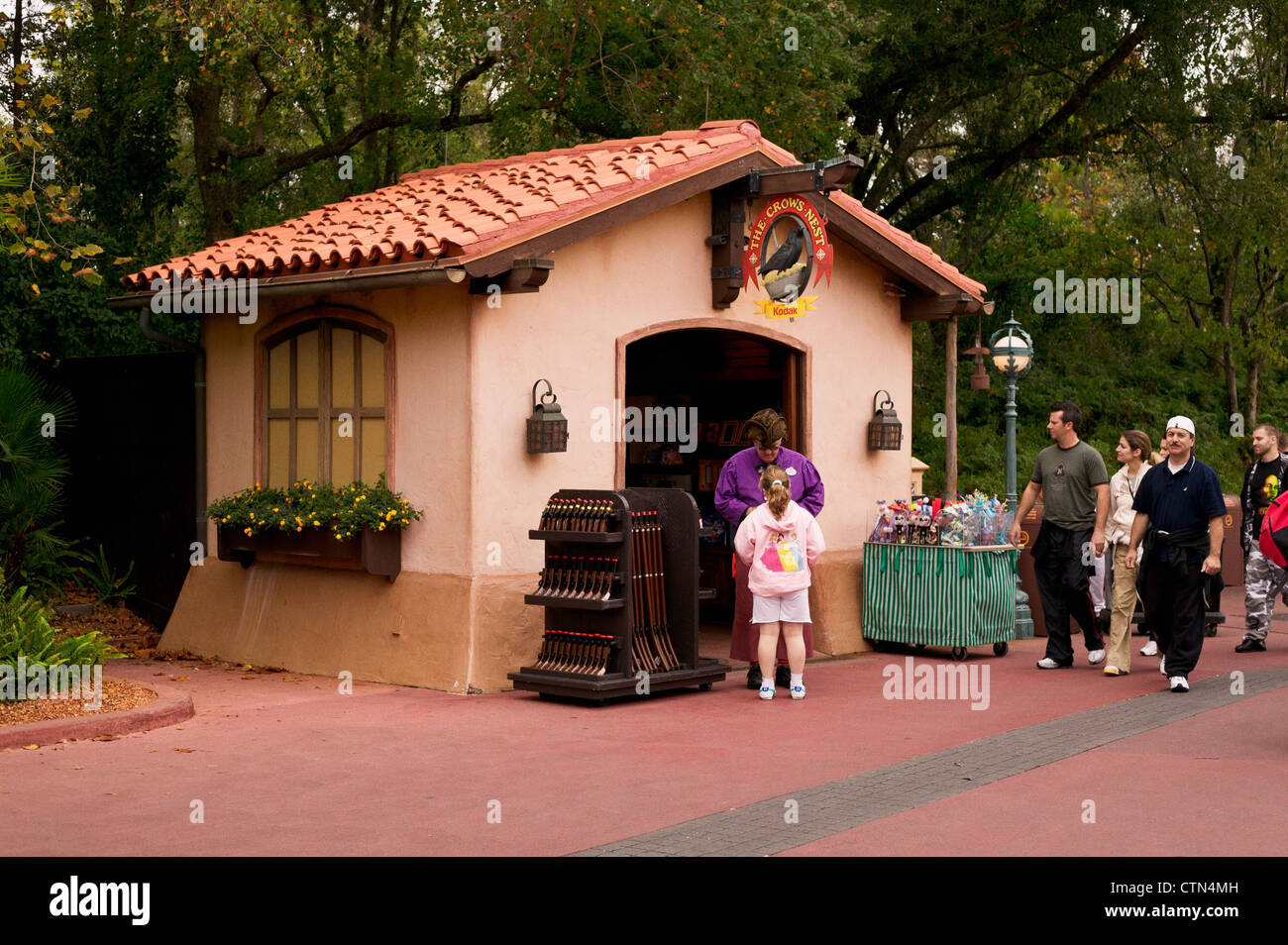 Tourists walking past The Crows Nest at Disney's Magic Kingdom, Orlando ...