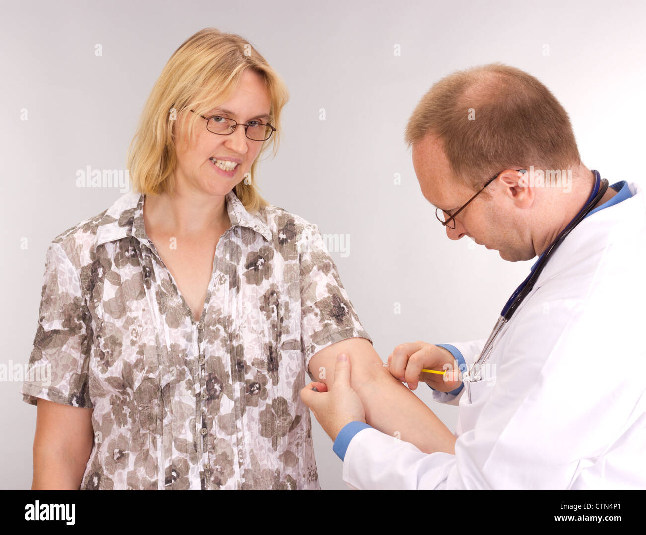 Medical doctor and patient Stock Photo - Alamy