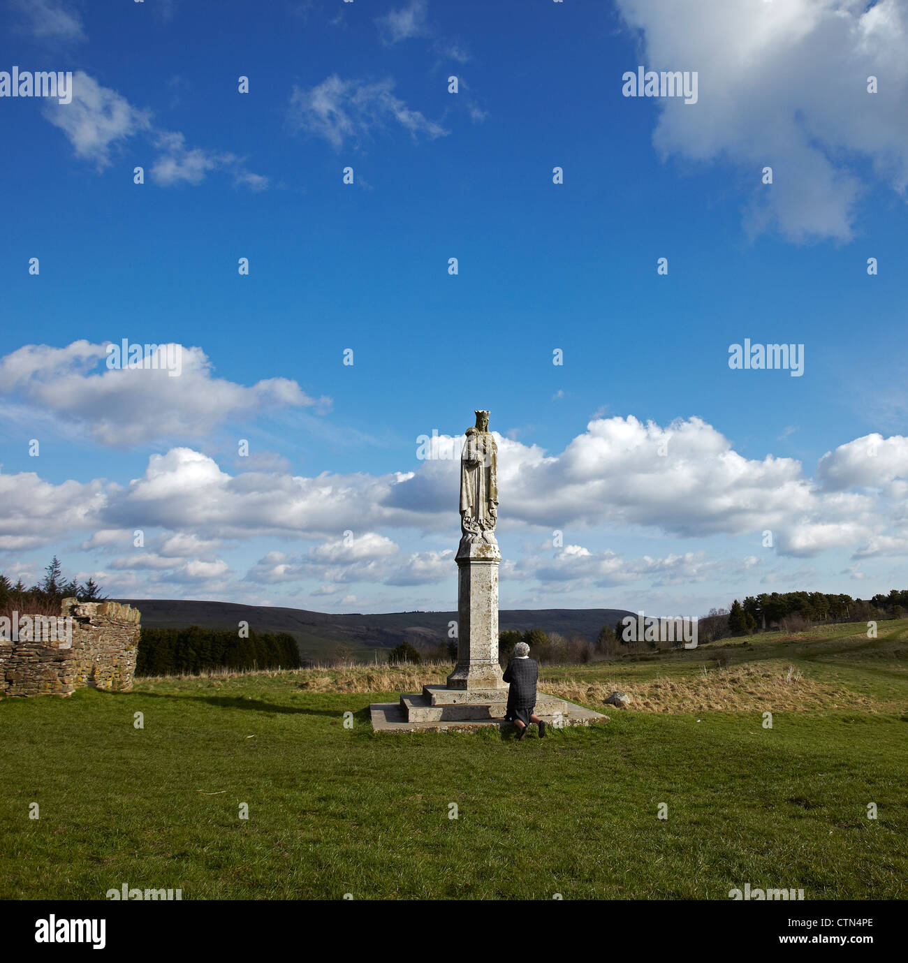 Pilgrim praying, at 'Our Lady of Penrhys' Statue, Penrhys, South Wales ...