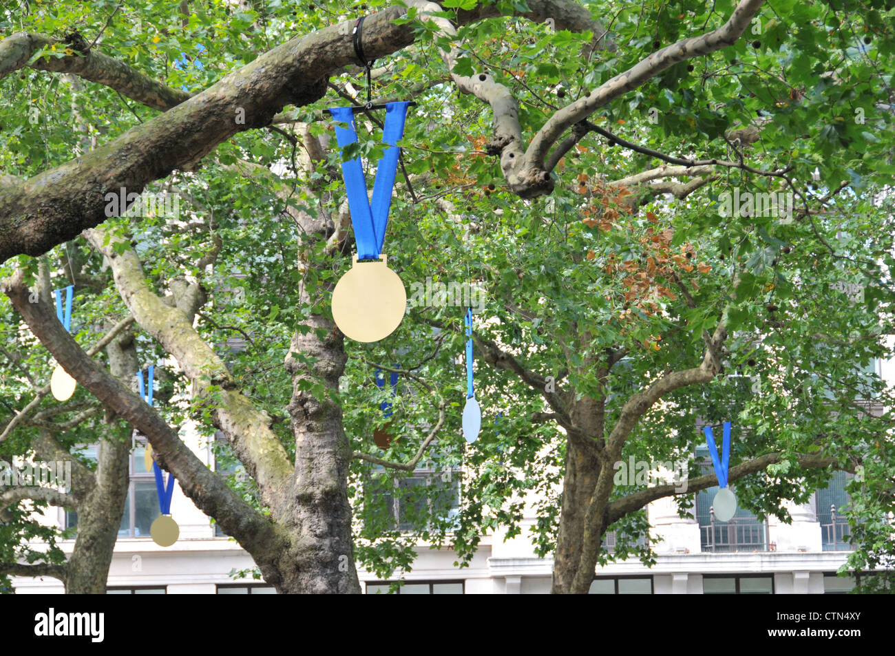 London 2012 Olympics Gold medals theme trees Leicester Square Stock ...