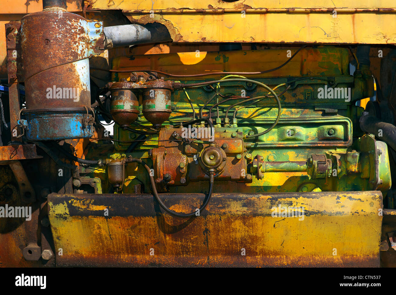 Rusty and disused tractor engine Stock Photo - Alamy