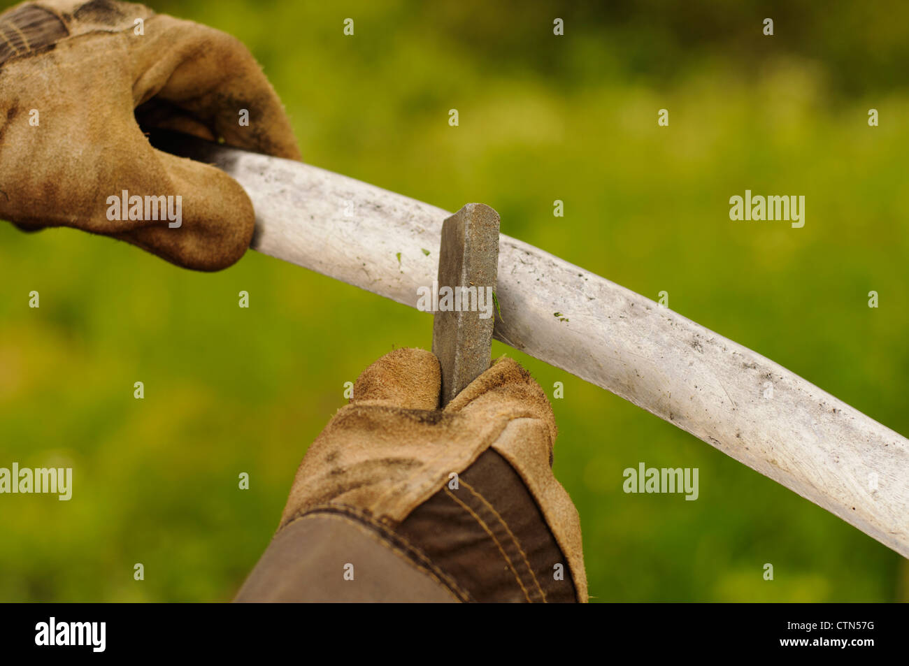 Scythe sharpening hi-res stock photography and images - Alamy