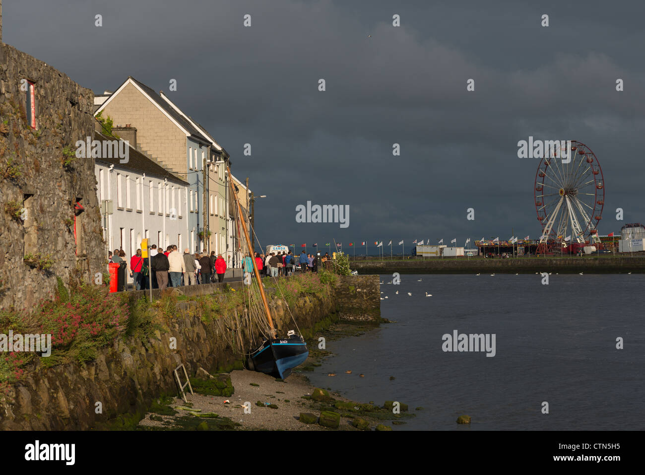 View from Claddagh of The Long Walk and Old Quays at dusk, Galway city ...