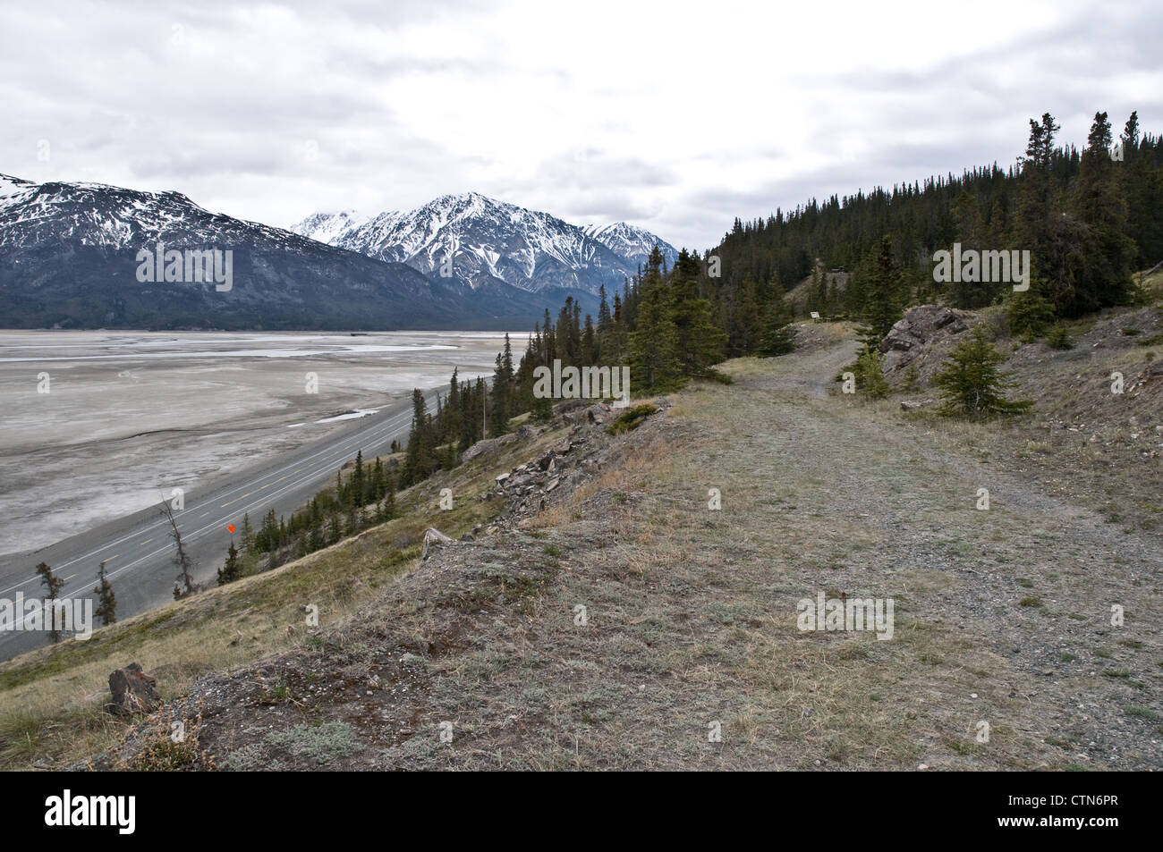 The old original route of the Alaska Highway above its modern version ...