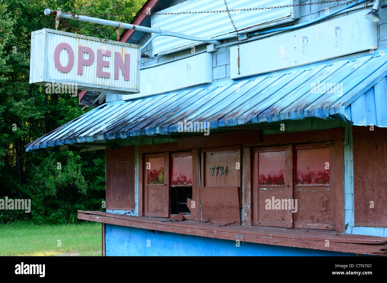 Old barbecue restaurant retains enough paint to be a colorful remnant ...