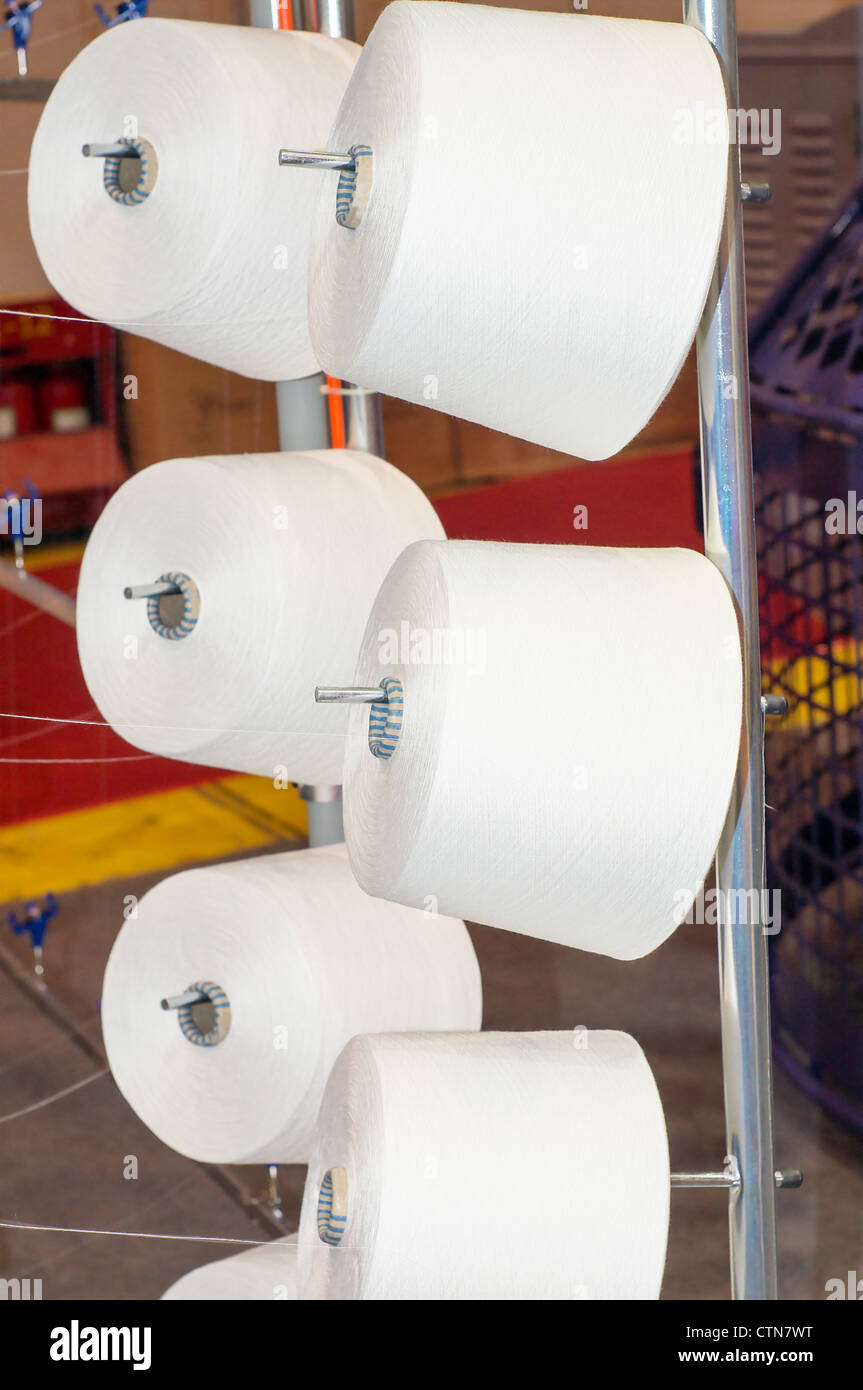 Yarn spools in a textile factory hi-res stock photography and images ...