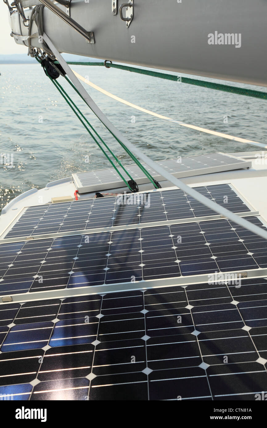 Solar charging batteries aboard a sail boat Photovoltaic panels energy ...
