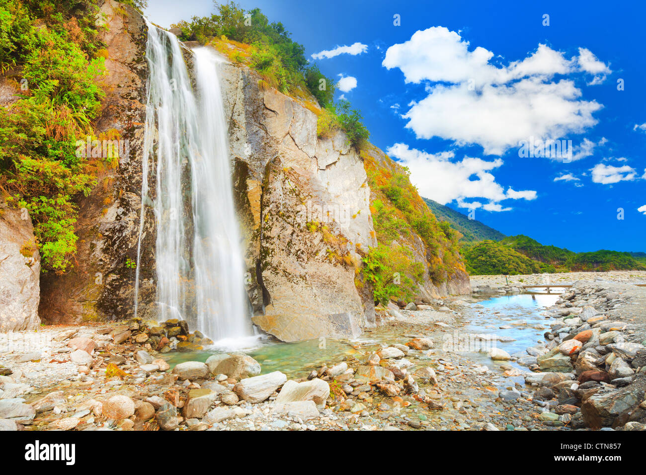 waterfall on the way to Fox glacier Stock Photo - Alamy