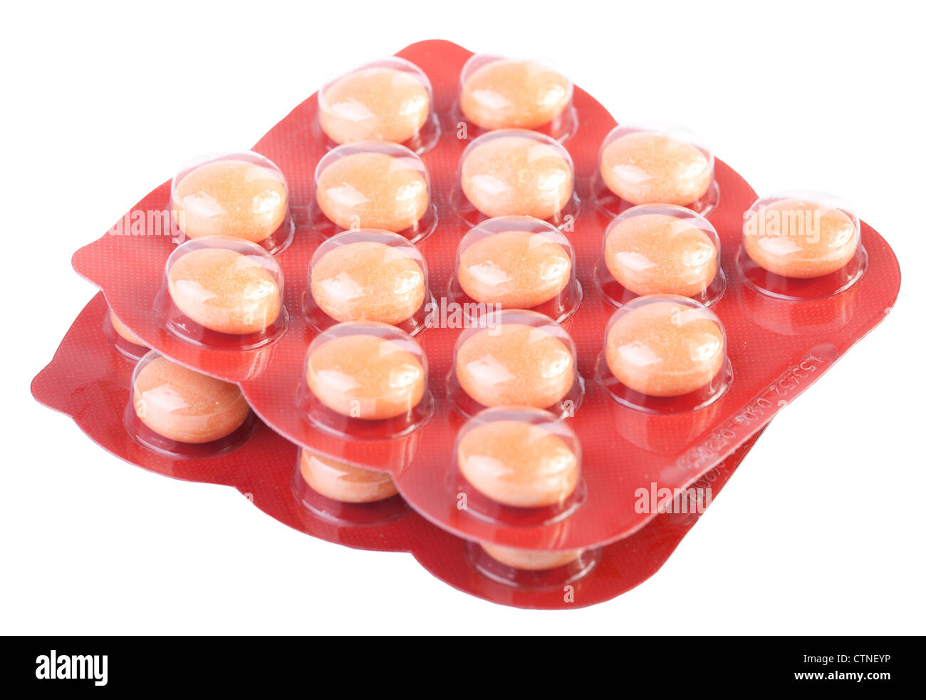 yellow capsules isolated on white background Stock Photo - Alamy