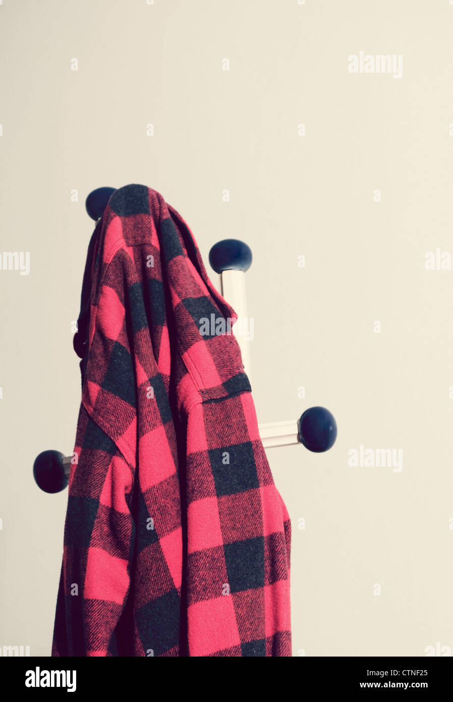 Jacket on hook Stock Photo - Alamy