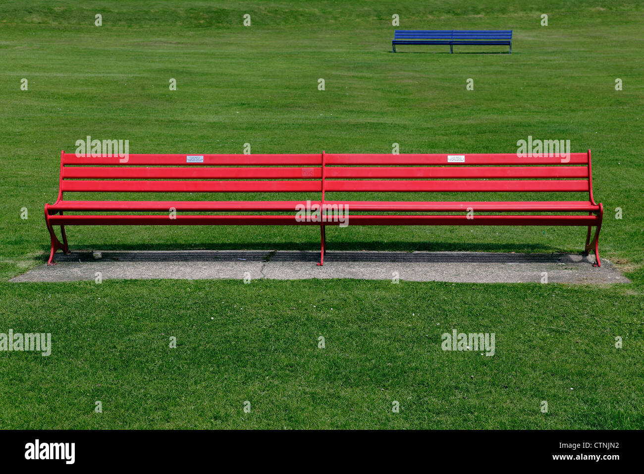 A red bench, UK Stock Photo - Alamy