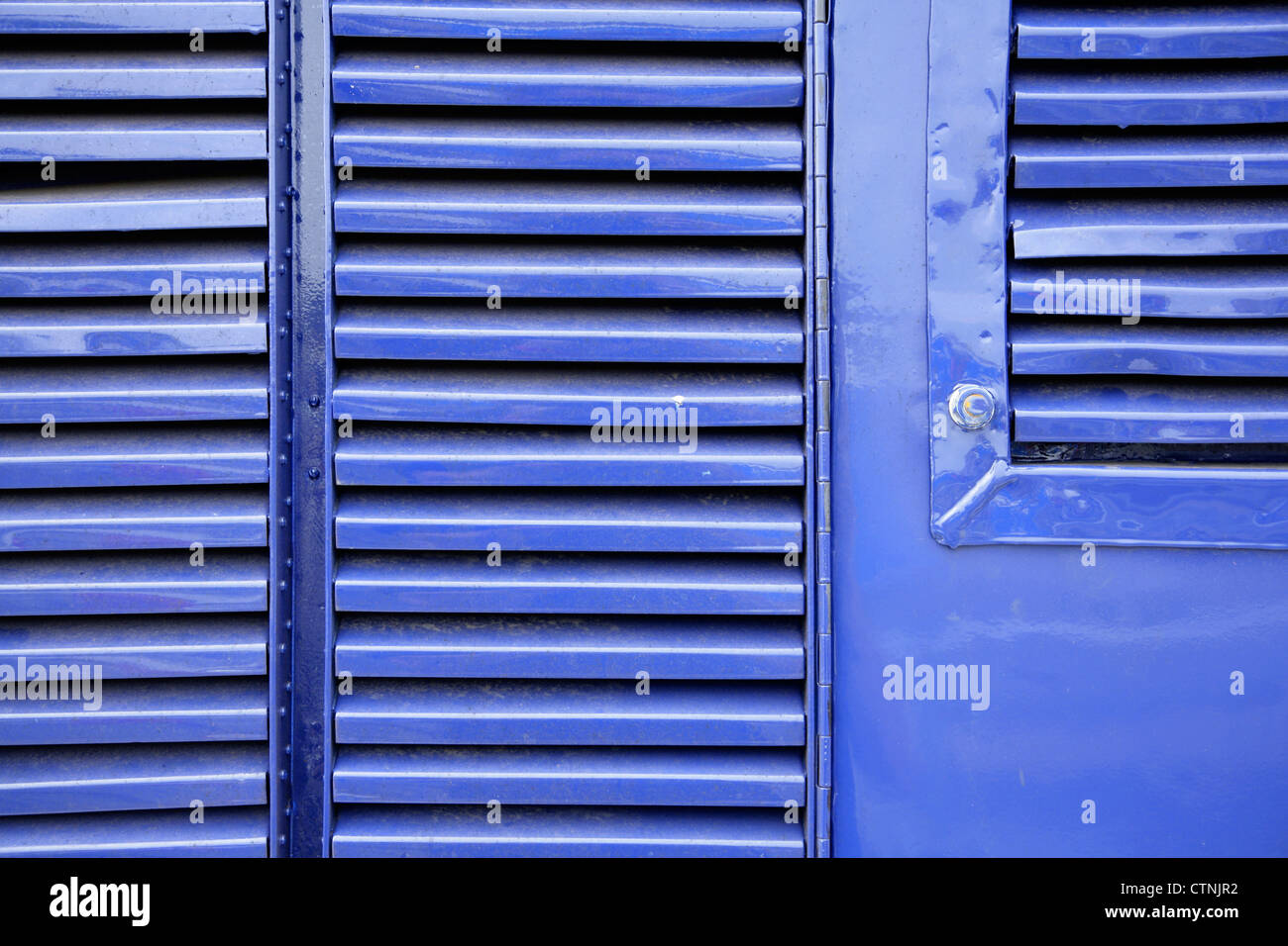 Louvres in blue metal panels Stock Photo - Alamy