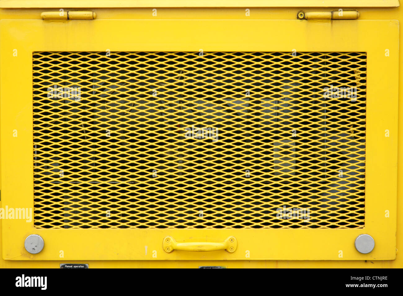 Yellow steel mesh panel Stock Photo - Alamy