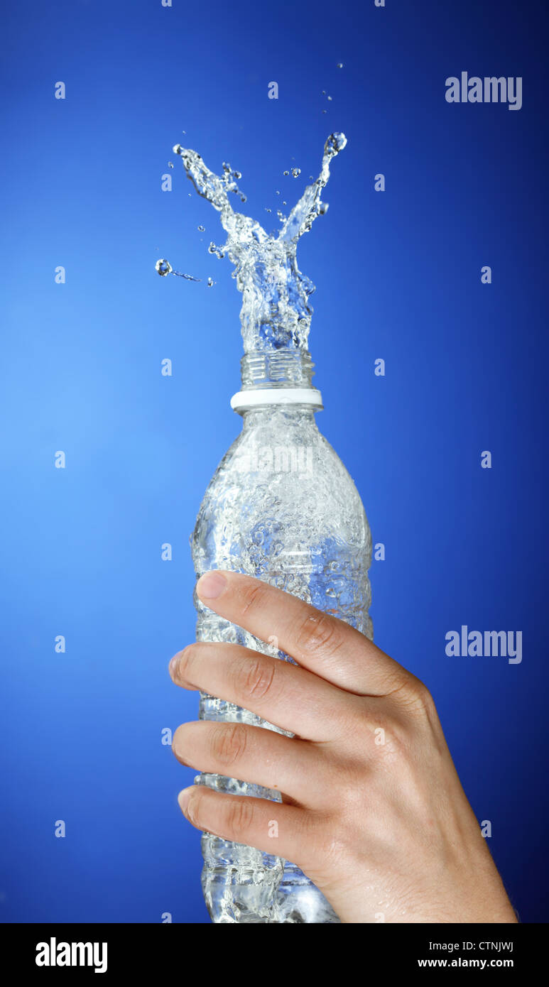 Water splashing out of a water bottle Stock Photo - Alamy