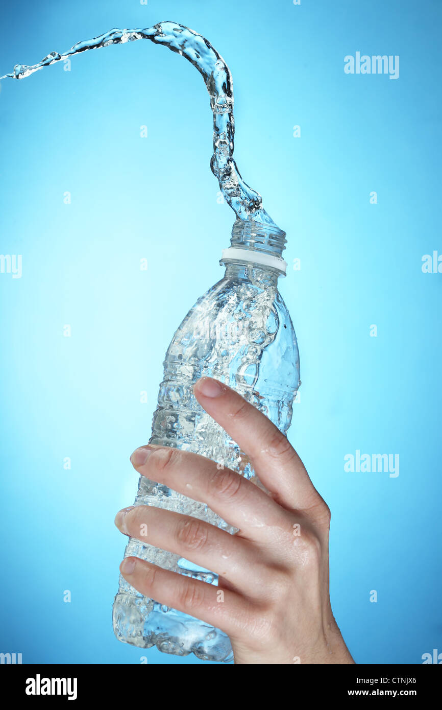 Water splashing out of a water bottle Stock Photo - Alamy