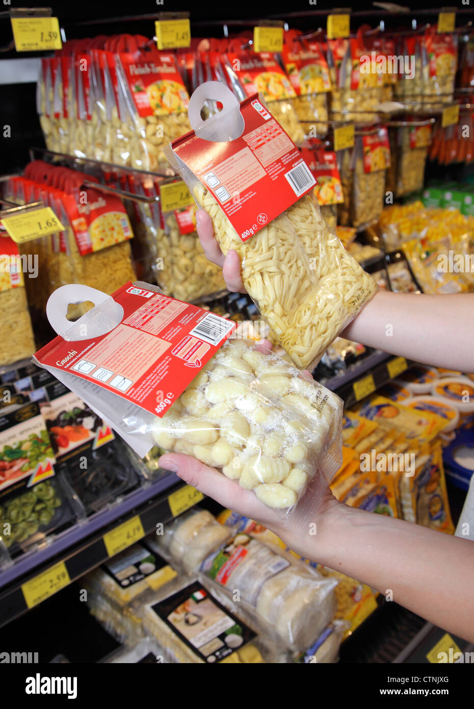 Shopping in a large supermarket. Fresh pasta, noodle, products Stock ...