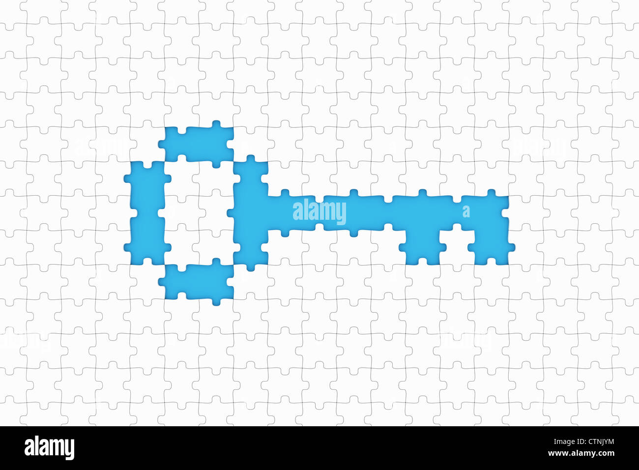 Puzzle with missing pieces in the shape of a key Stock Photo - Alamy