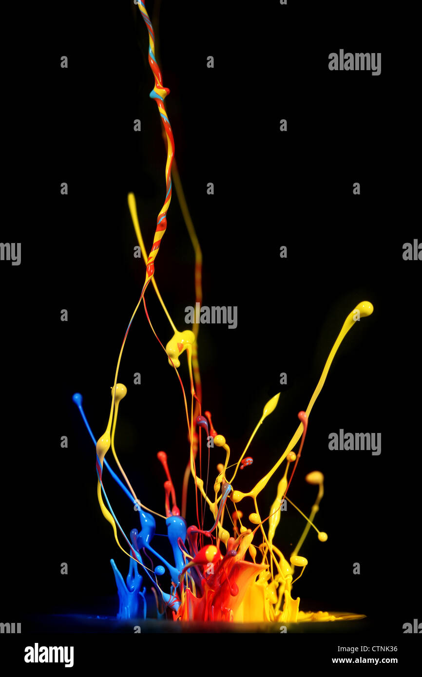 Colorful paint splashing Stock Photo - Alamy