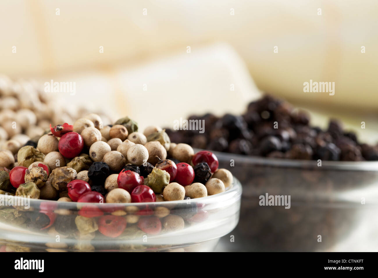 Close-up of mixed peppercorns in small glass bowl Stock Photo - Alamy