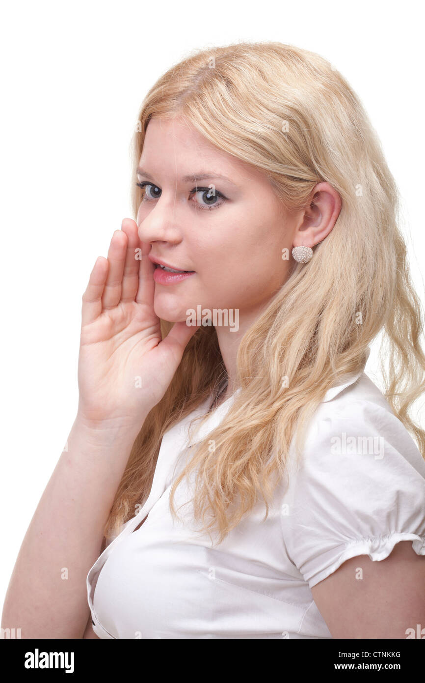 Business woman eavesdropping with hand behind her ear Stock Photo - Alamy