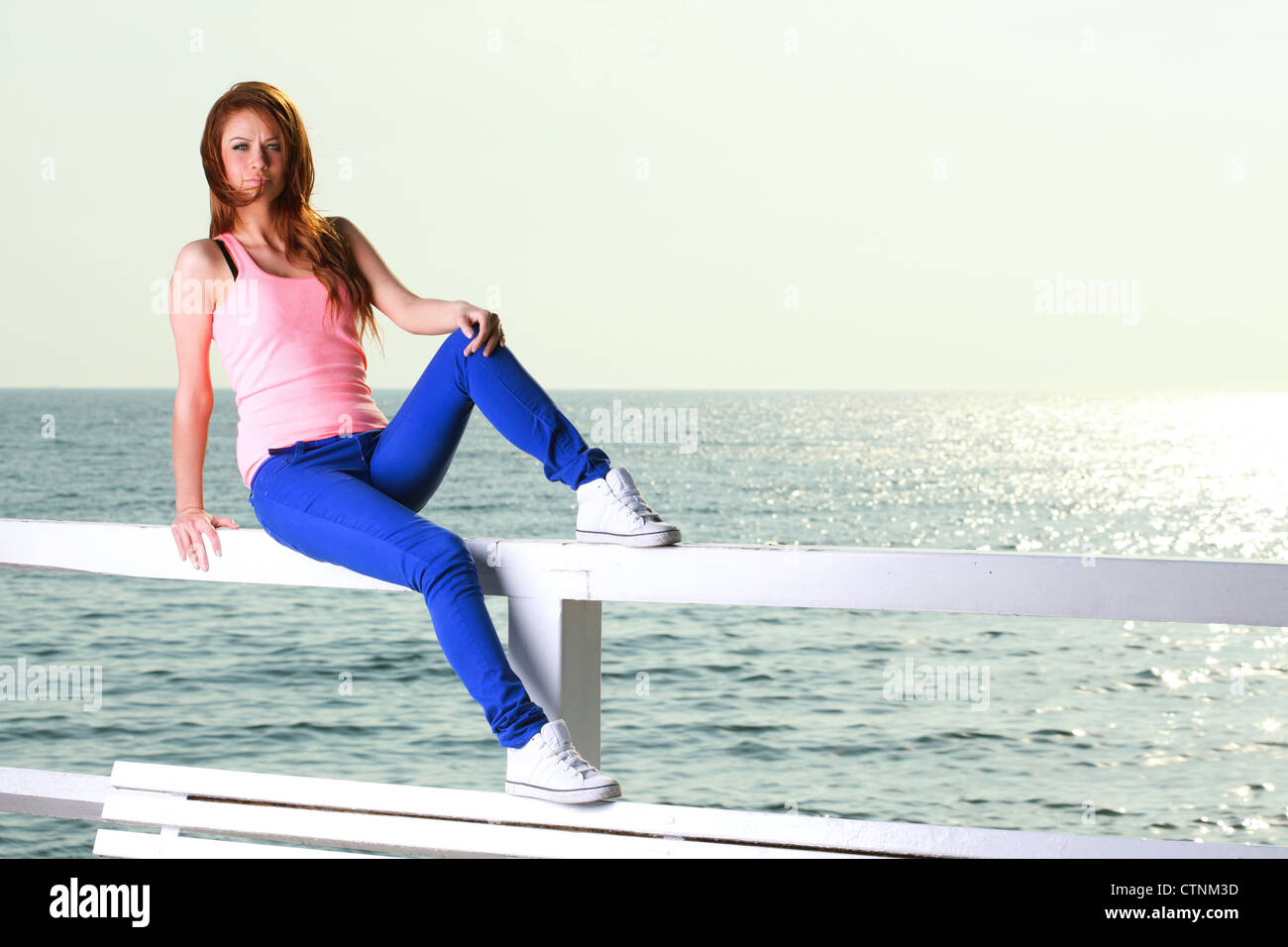 Attractive girl Young woman looking on background of sea sky Stock ...