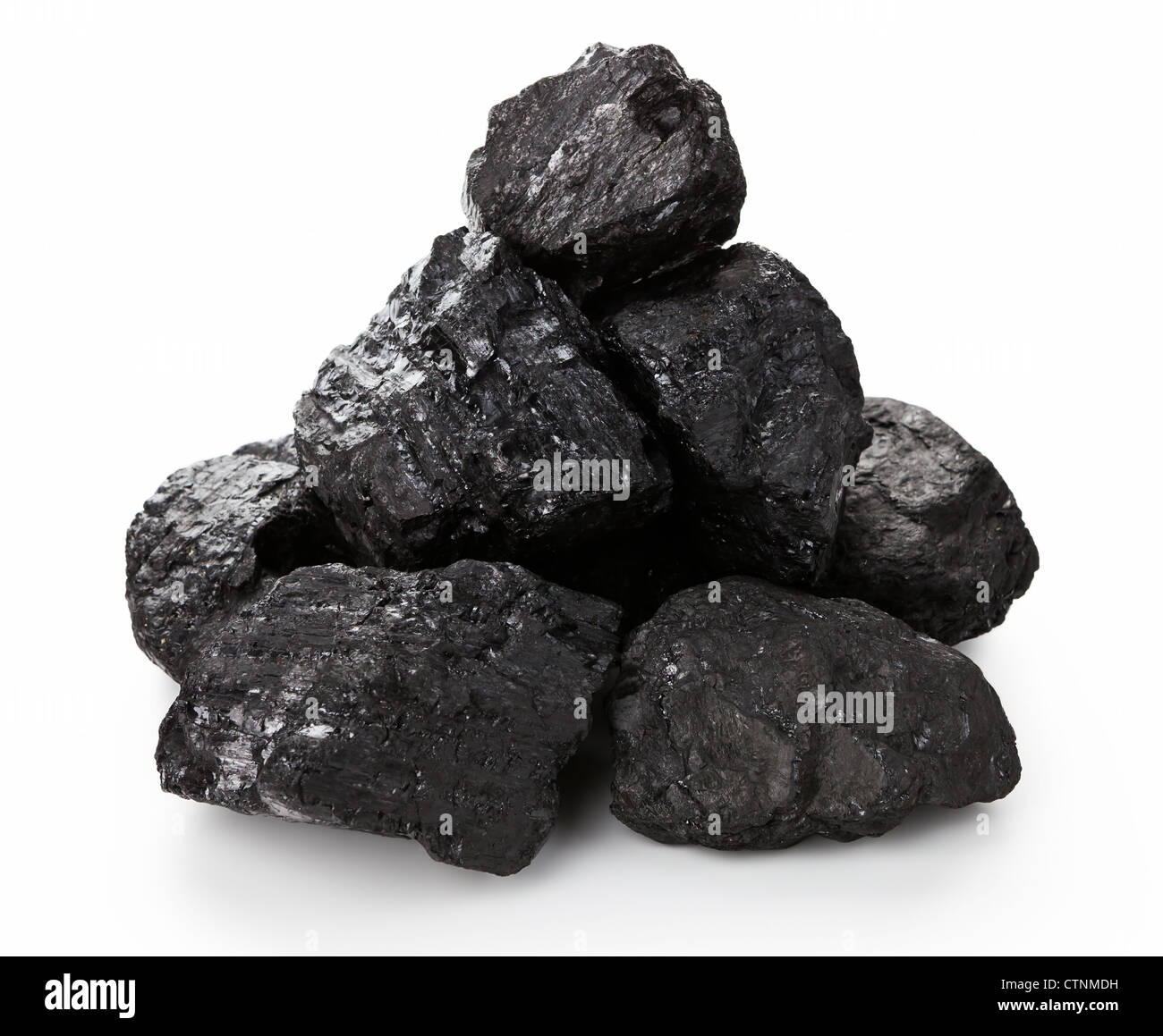 Stack of coal lumps isolated on white background Stock Photo - Alamy