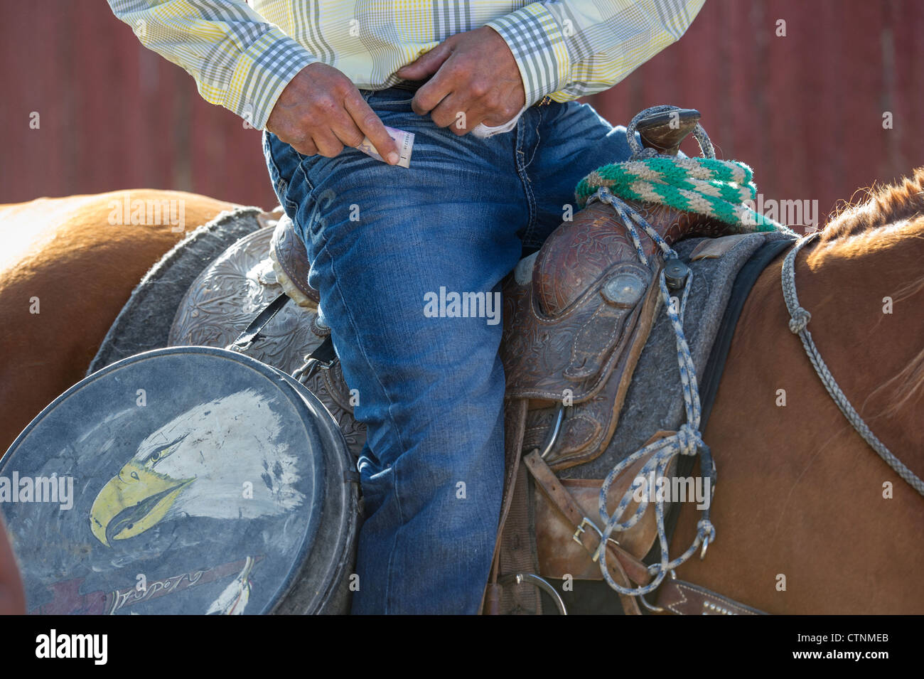 Native cowboy with a vintage western americana lariat lasso galvanized ...