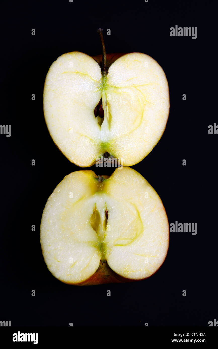 Apple cut in half Stock Photo - Alamy