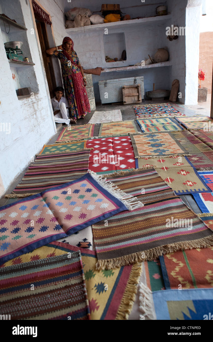 Handwoven Indian rugs for display in a rural house in Rajasthan Stock ...
