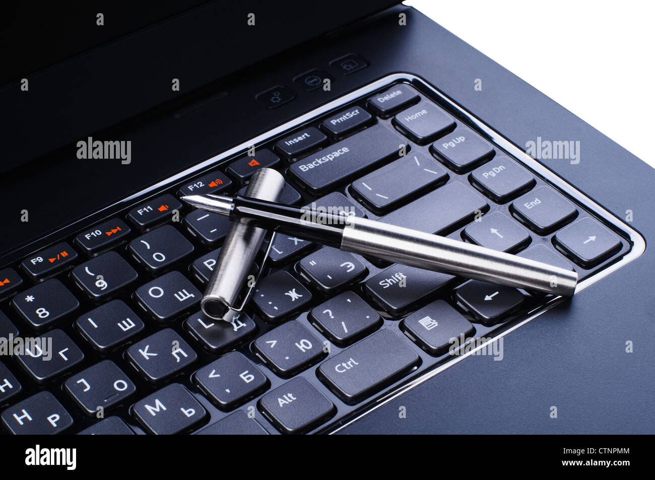Fountain pen on laptop keyboard isolated on white background Stock ...