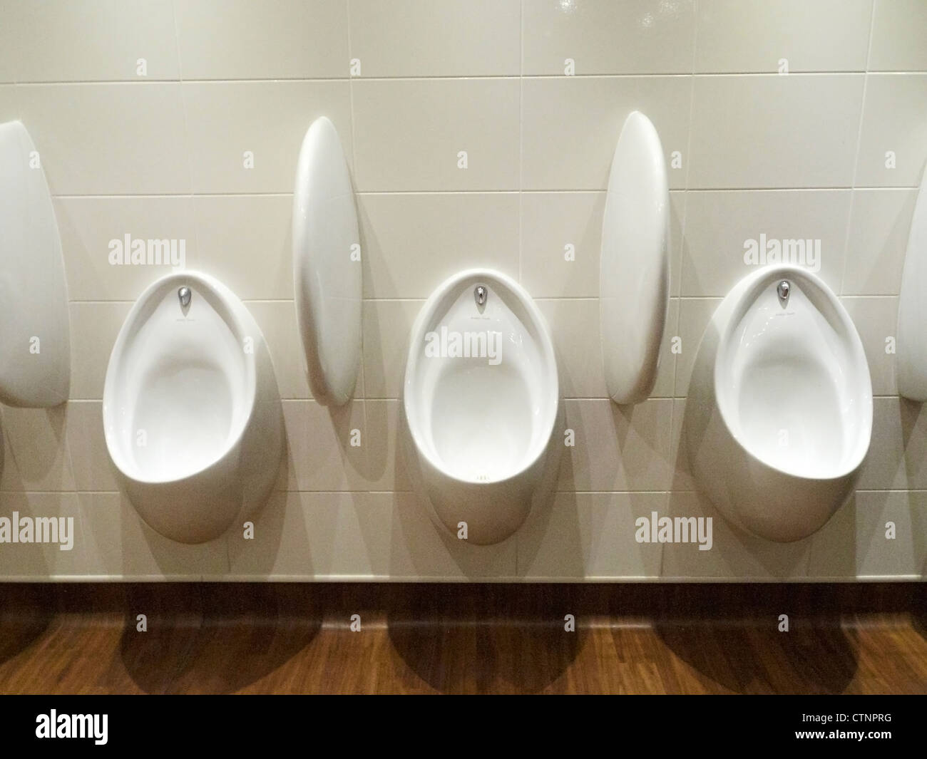 Men`s urinals in restaurant or pub in the UK Stock Photo - Alamy