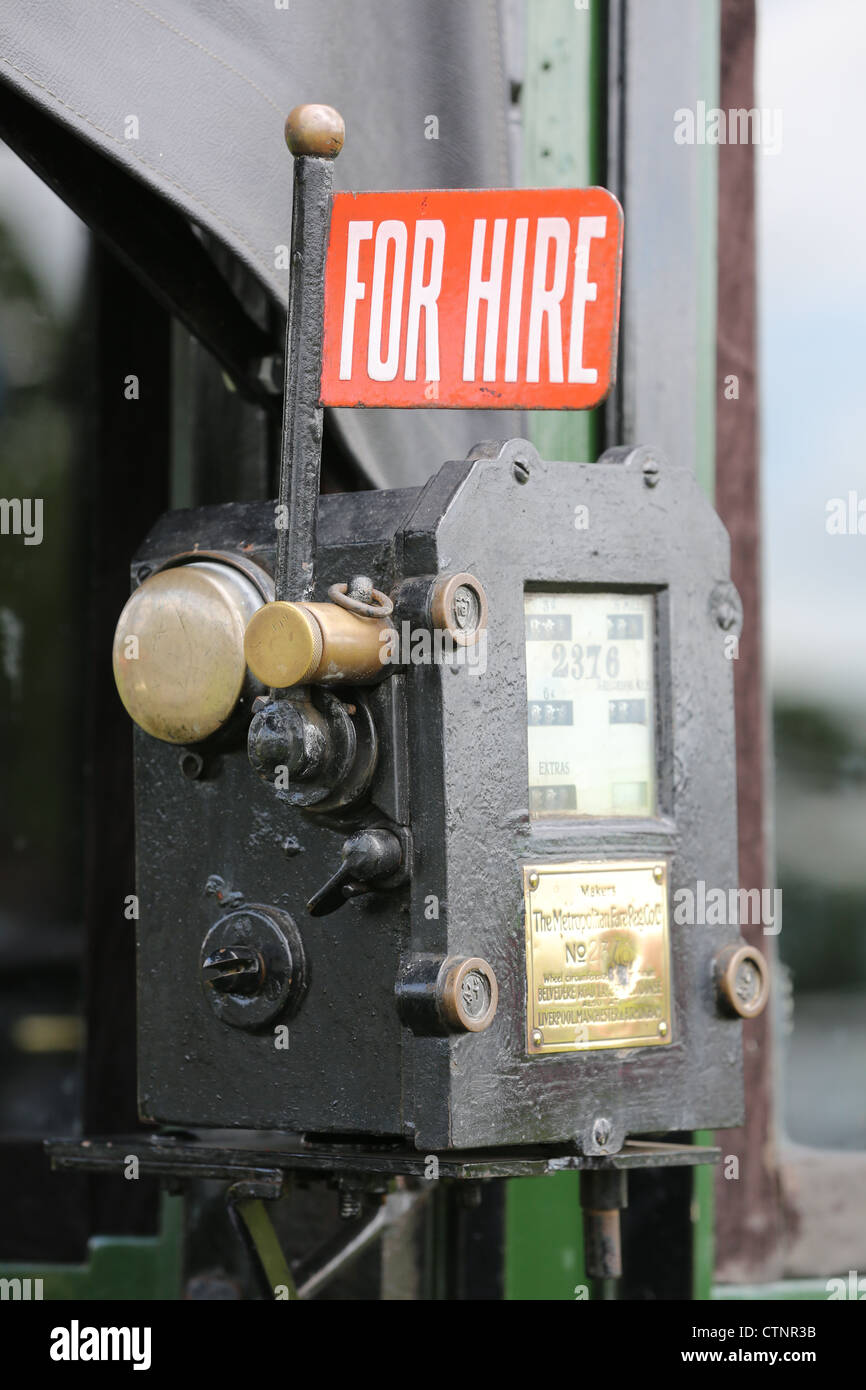 For Hire sign on Vintage Taxi meter Stock Photo - Alamy