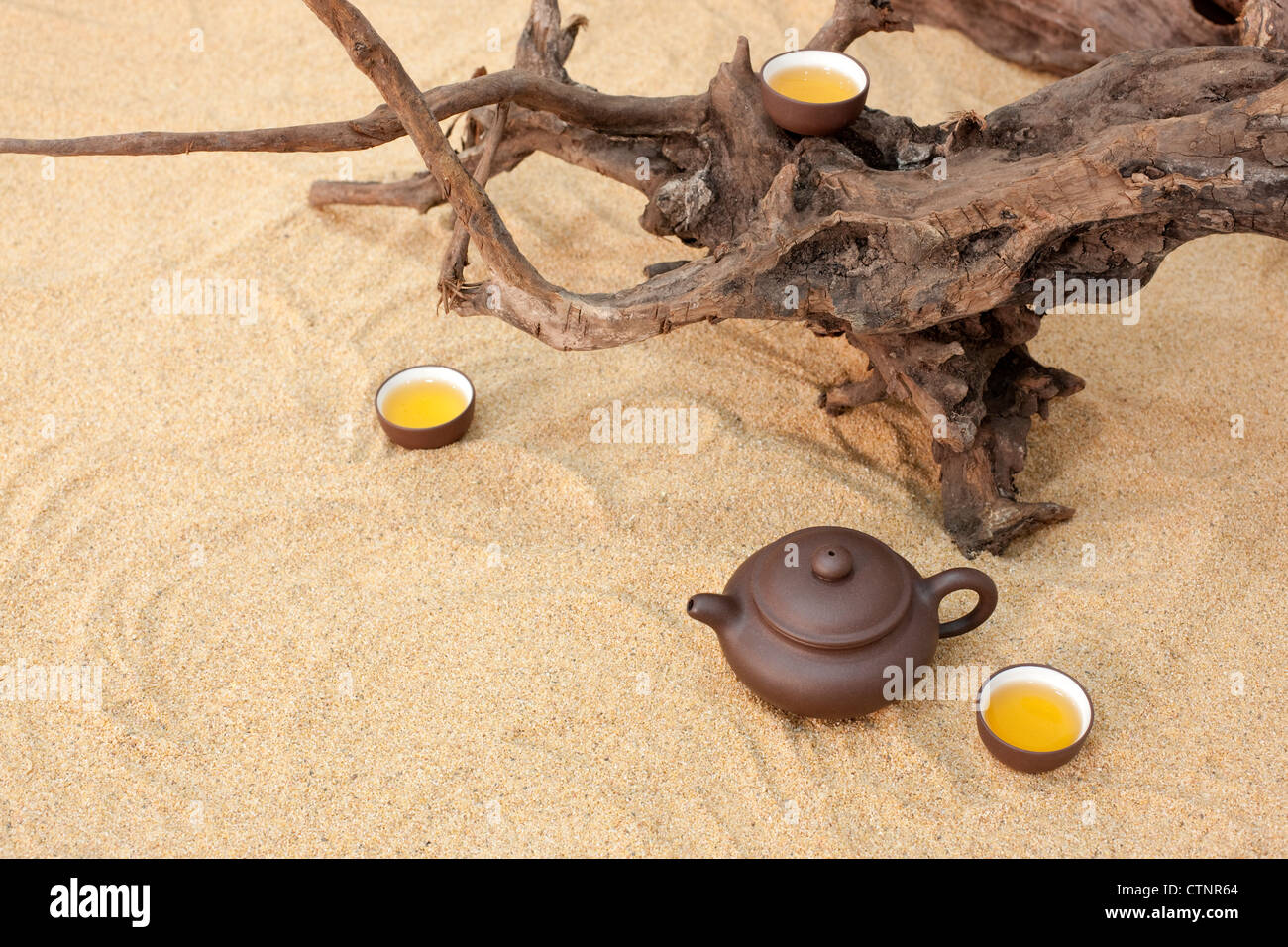 Tea set and dry branch Stock Photo - Alamy
