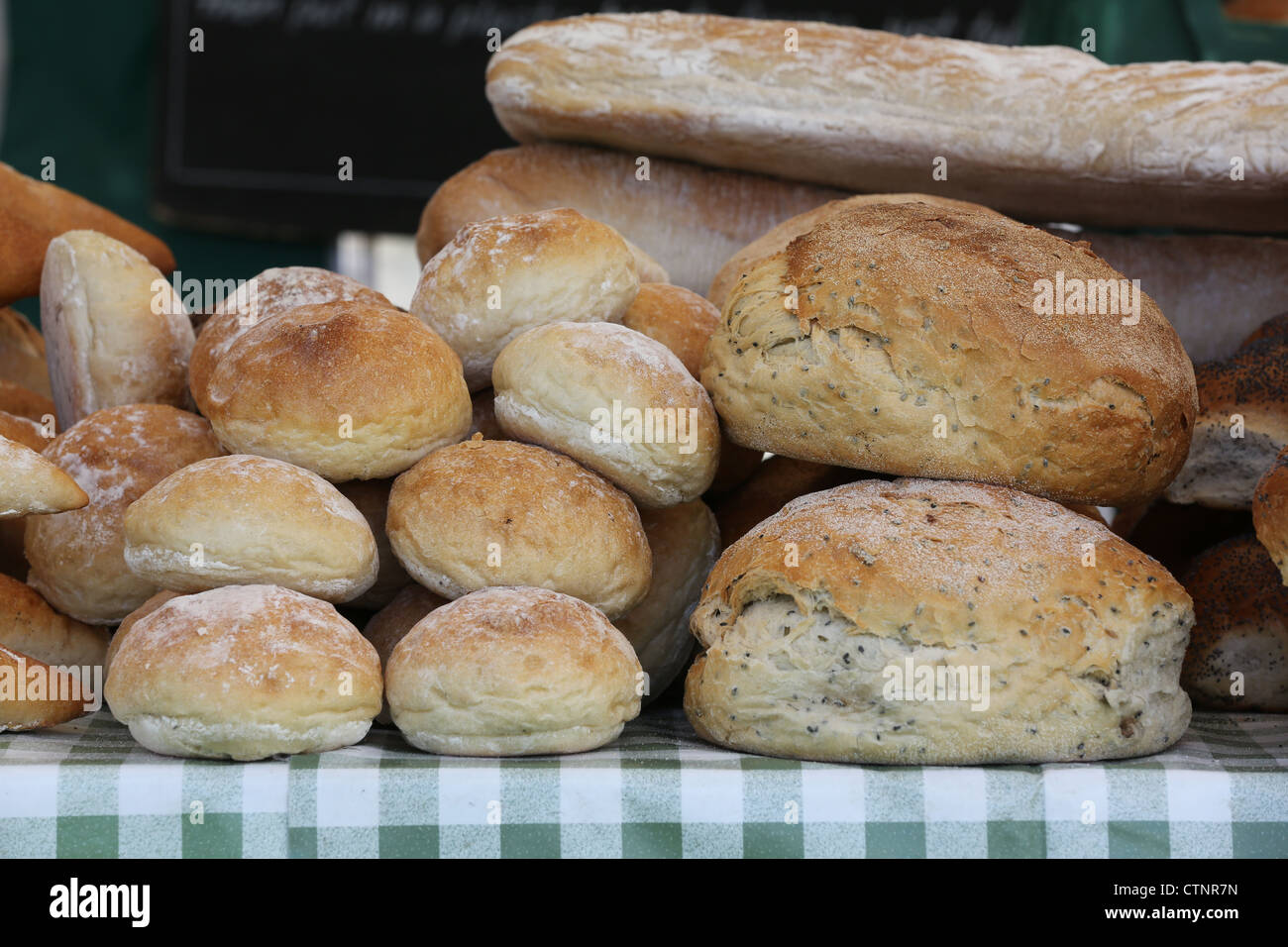 Bread for sale on a market stall Stock Photo - Alamy
