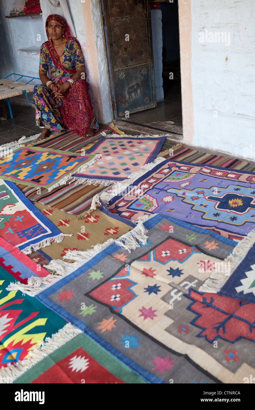 Handwoven Indian rugs for display in a rural house in Rajasthan Stock ...