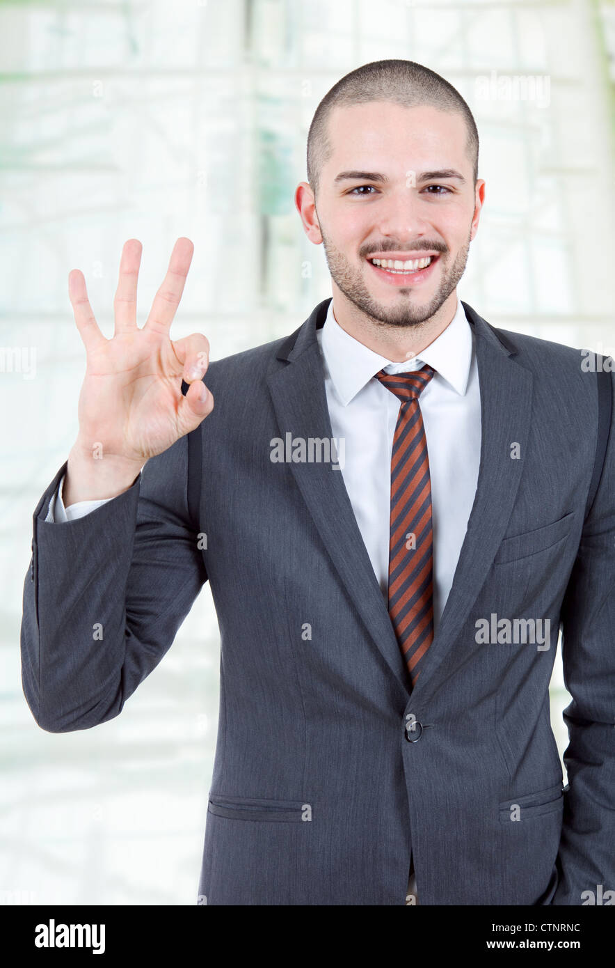 young business man winning at the office Stock Photo - Alamy