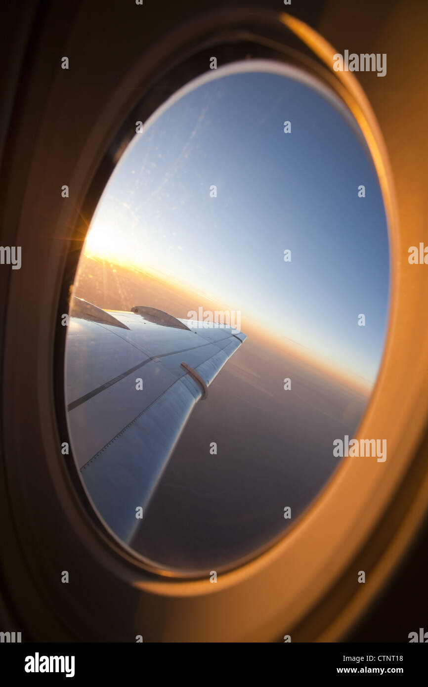 looking through airplane window at sunset Stock Photo - Alamy