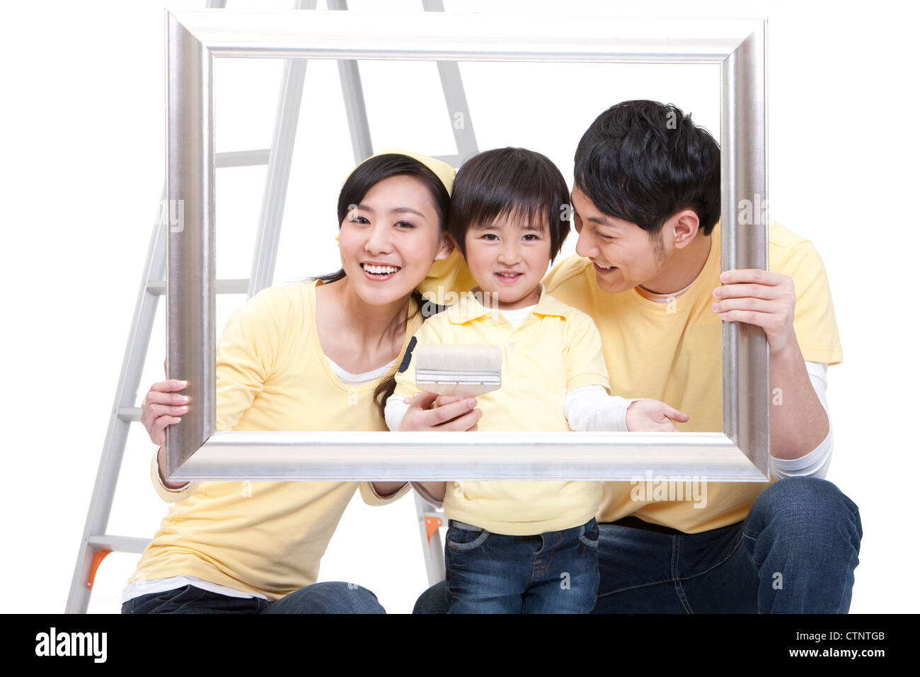 Young family doing home DIY Stock Photo - Alamy
