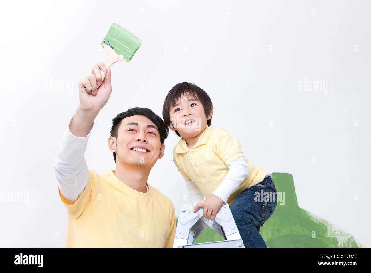 Father and son doing home DIY Stock Photo - Alamy