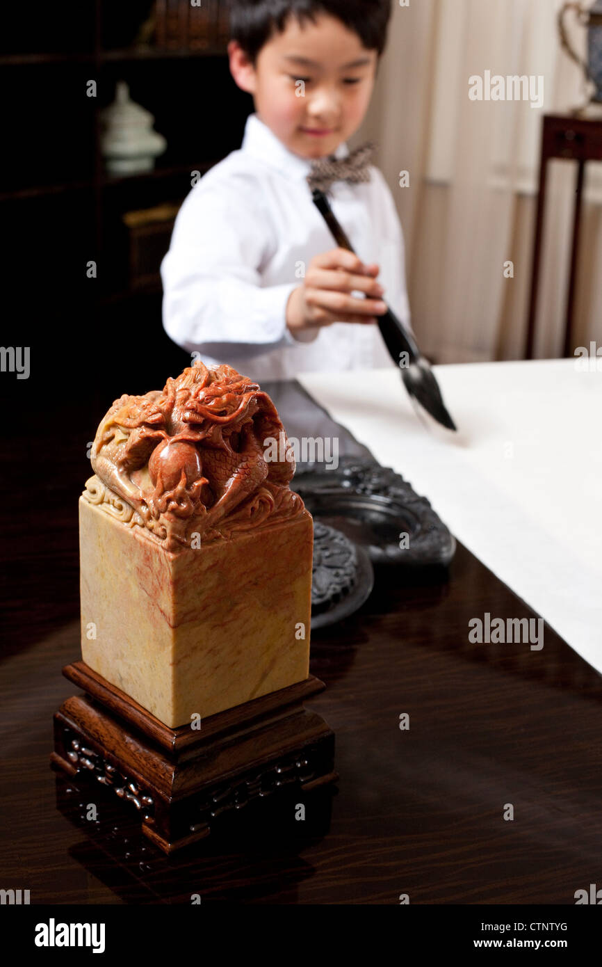 Calligraphy chinese child hi-res stock photography and images - Alamy