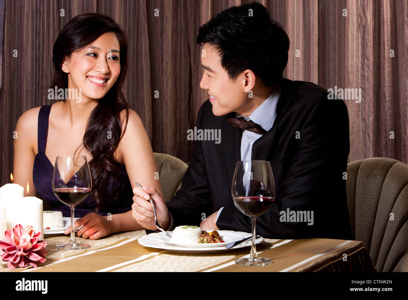 Young couple having romantic dinner Stock Photo - Alamy